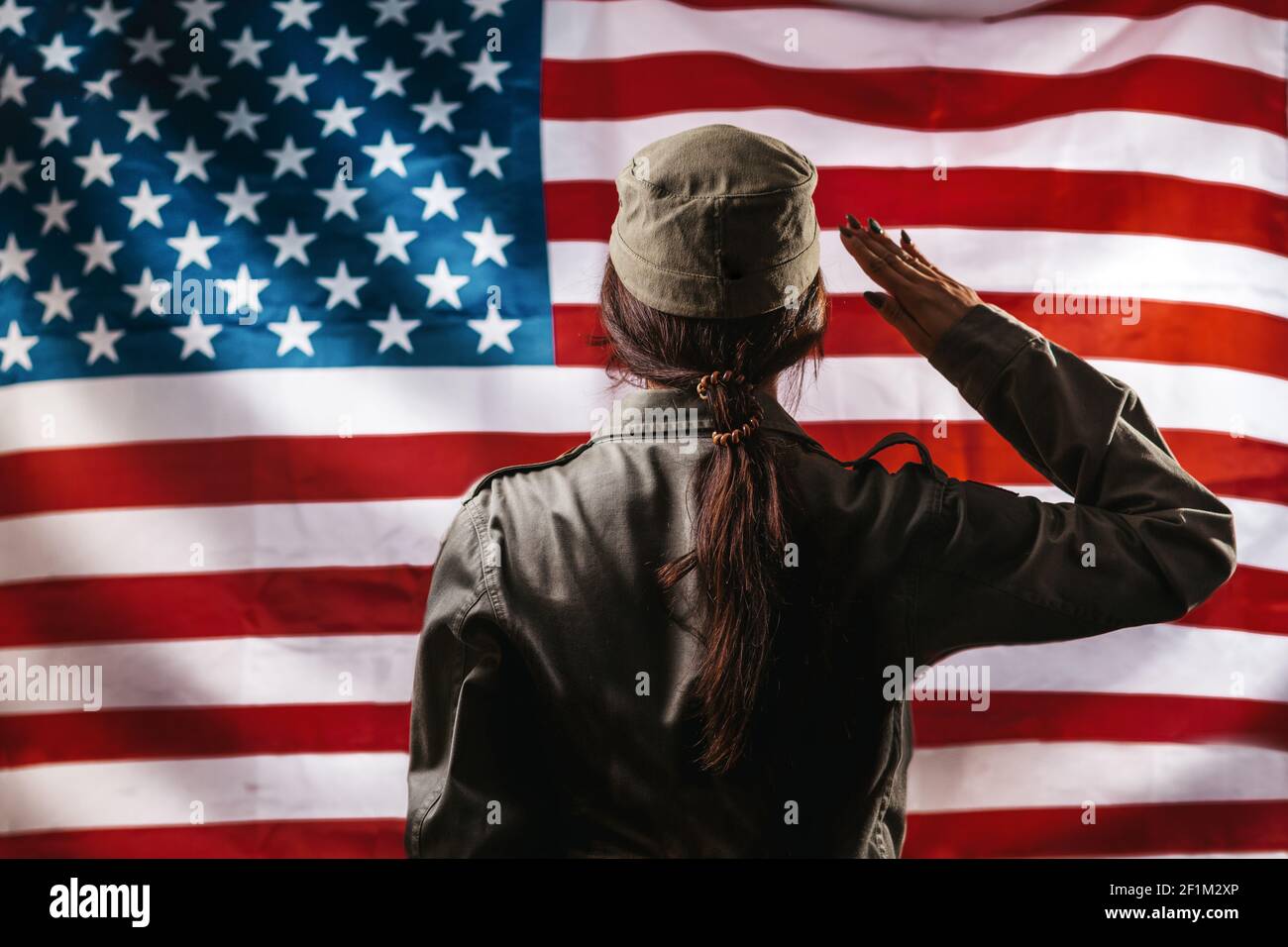 National holidays in the United States. A female soldier saluting ...
