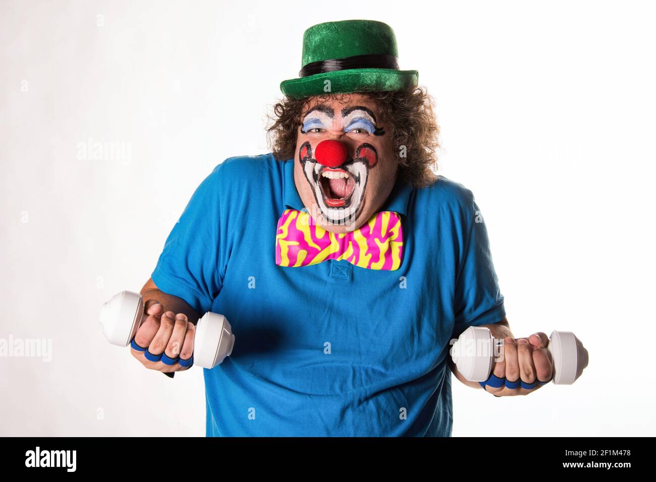 Holidays. Funny fat clown. White background Stock Photo - Alamy