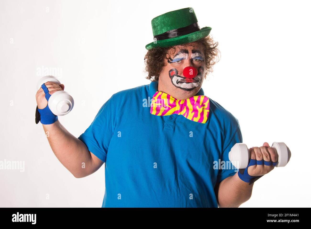 Holidays. Funny fat clown. White background Stock Photo - Alamy