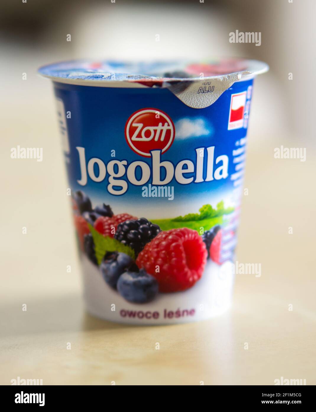 POZNAN, POLAND - Feb 19, 2014: POZNAN, Zott Jogobella yogurt with fruit ...