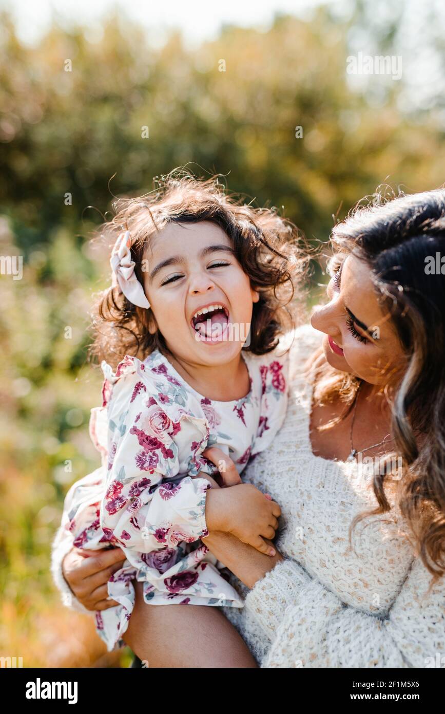 Happy mother and daughter together Stock Photo - Alamy
