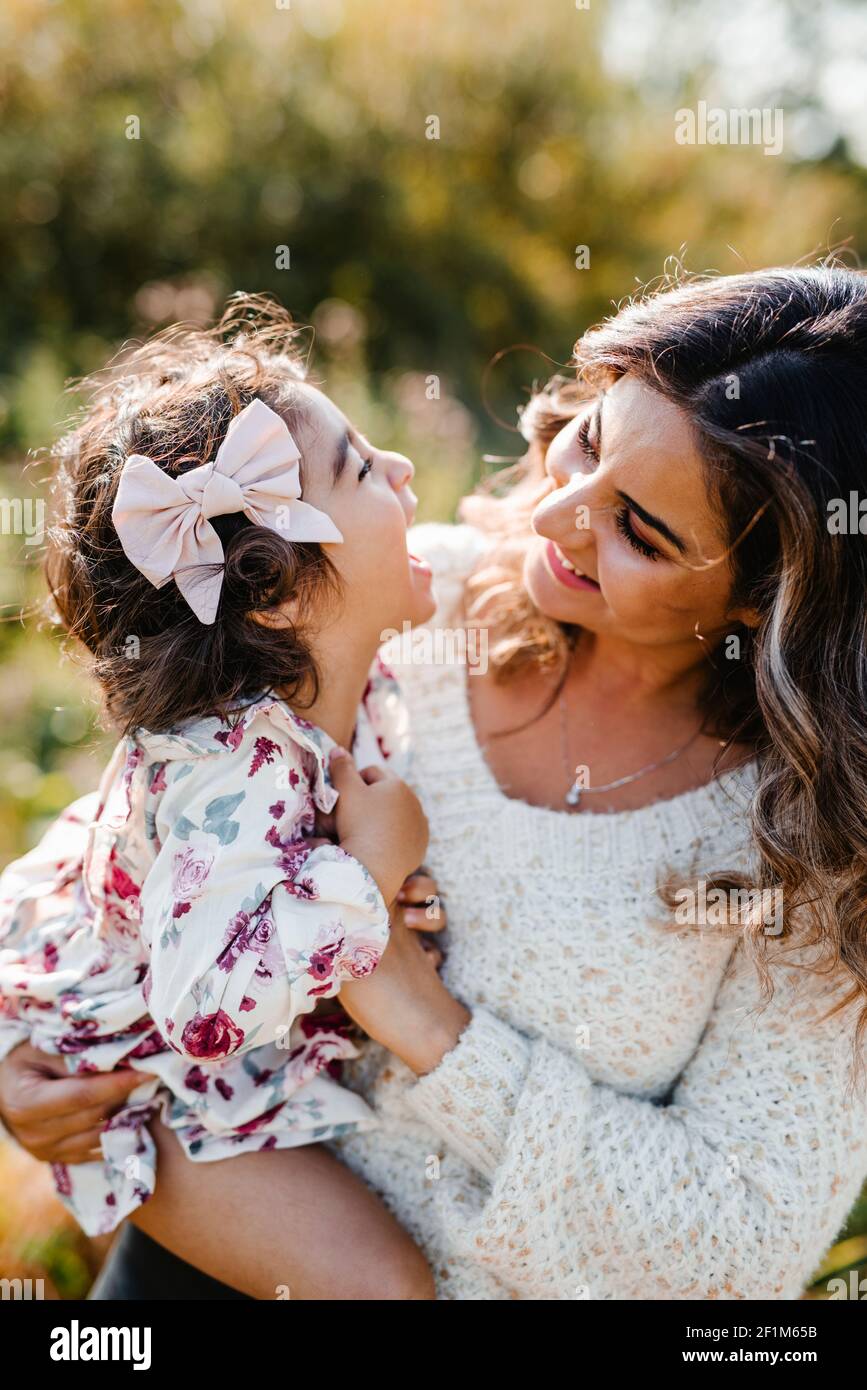 Happy mother and daughter together Stock Photo - Alamy
