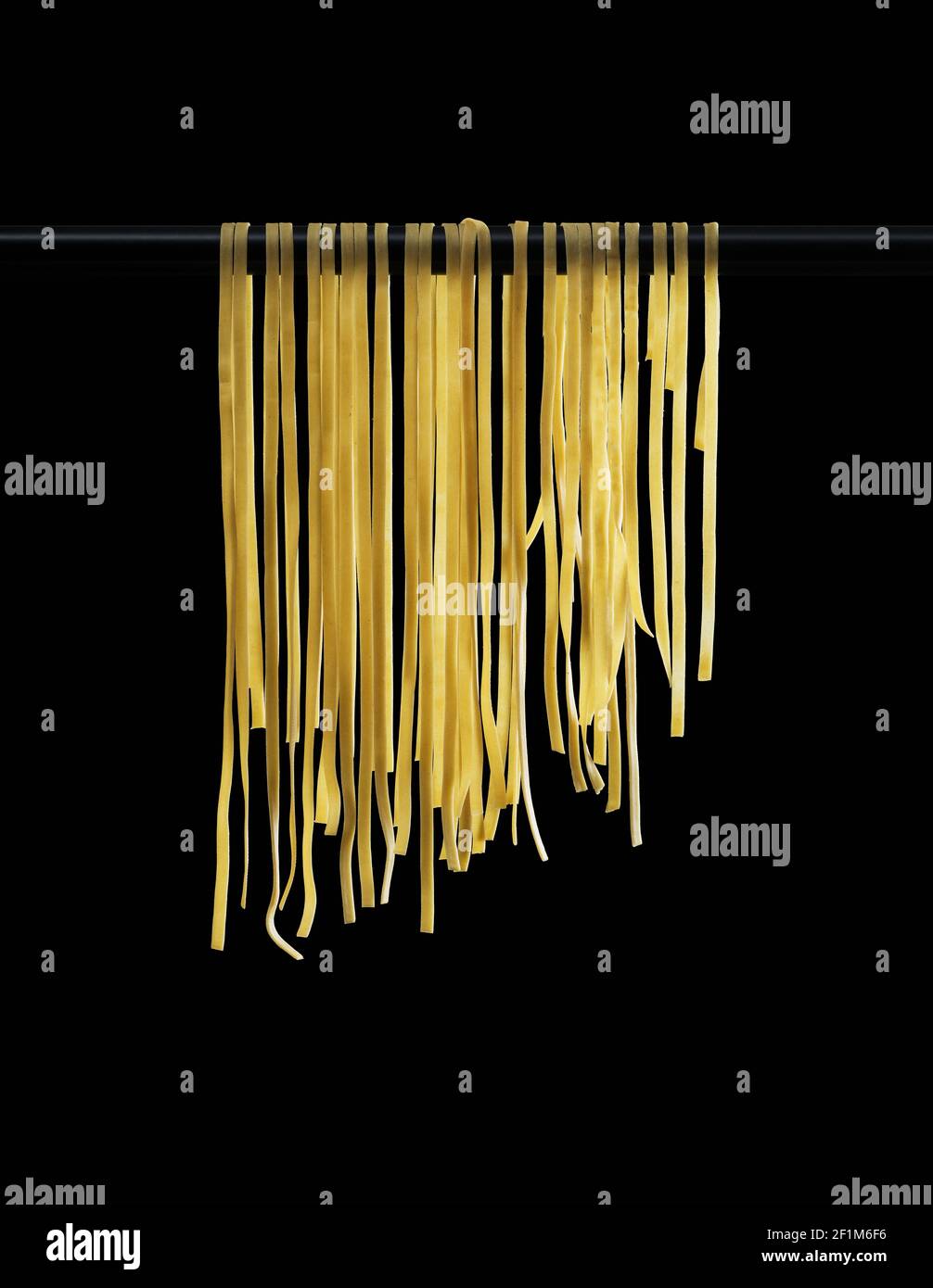 Hanging pasta color background hi-res stock photography and images - Alamy