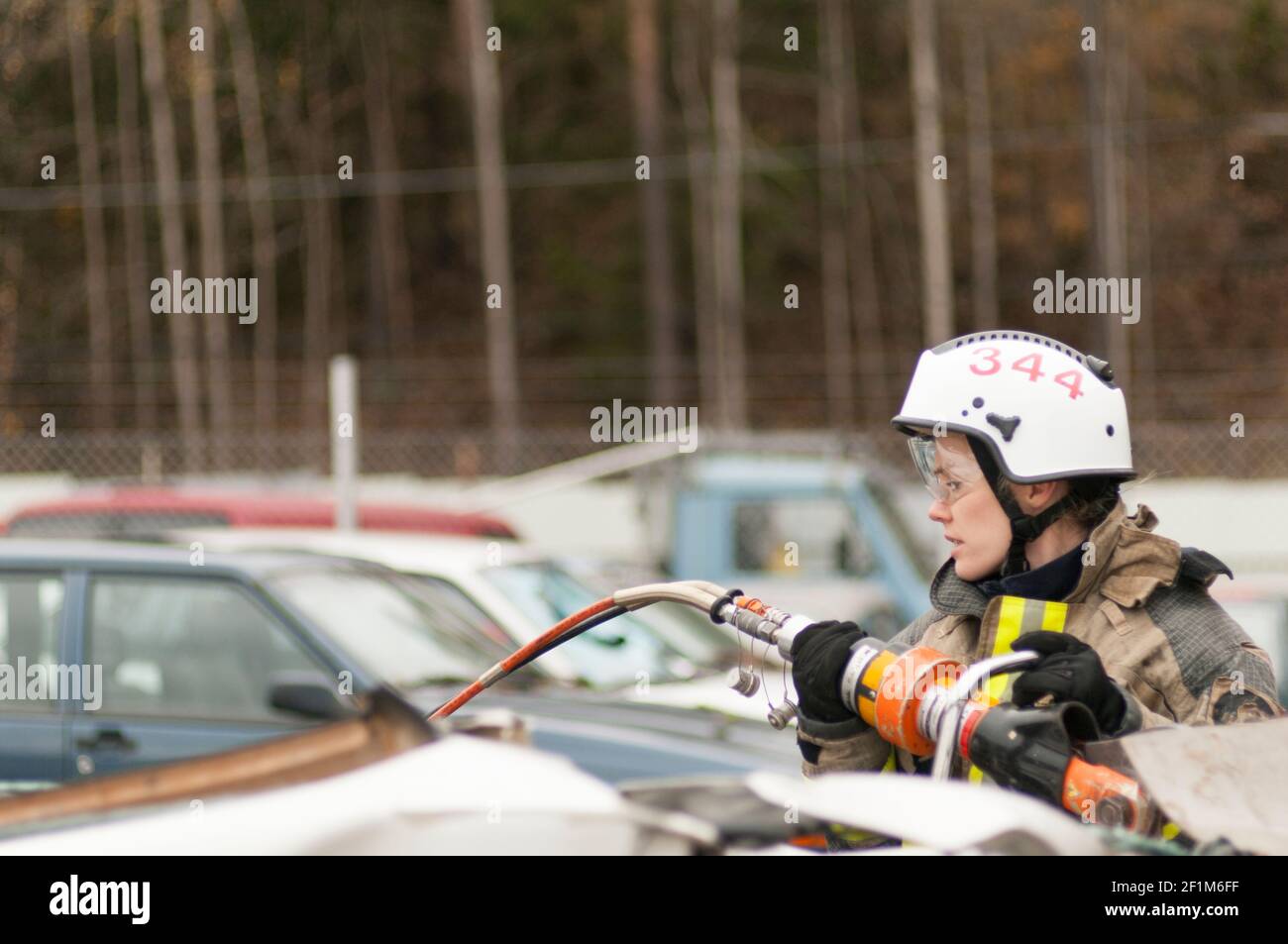 Female firefighter hose hi-res stock photography and images - Alamy