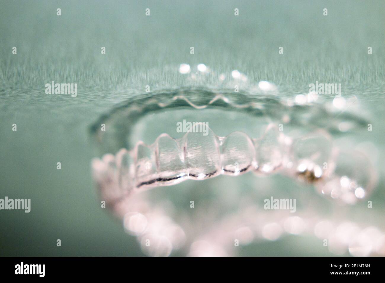 Retainer splint and transparent teeth corrector. No people Stock Photo ...