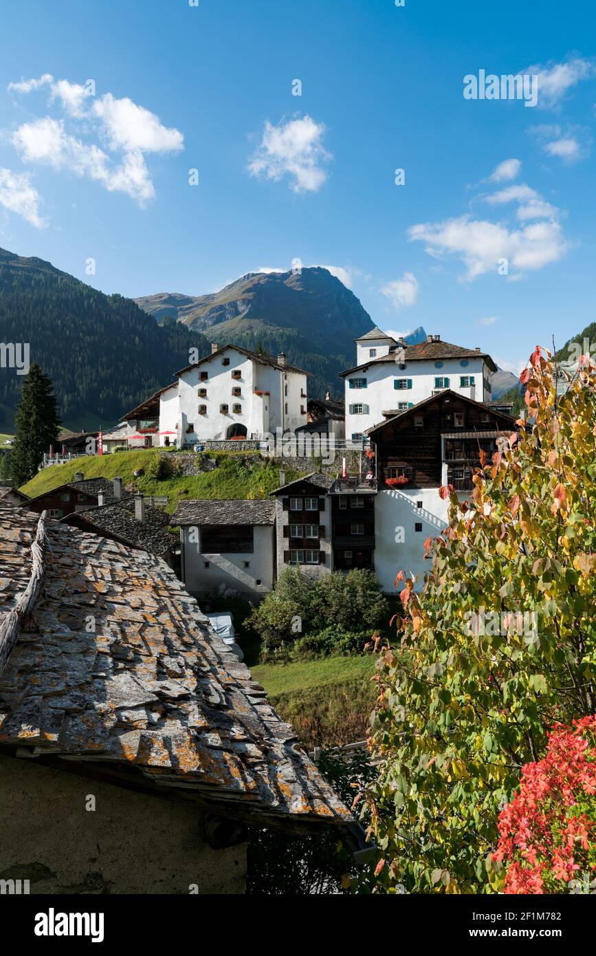 Picturesque mountain village with white stone houses and stone roofs ...