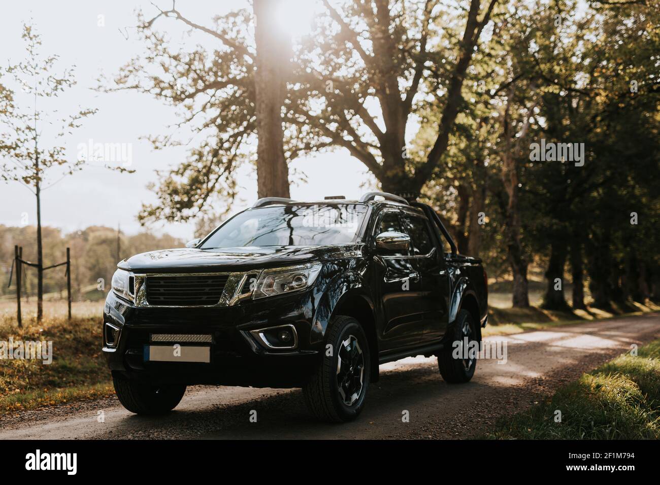 Car on dirt road Stock Photo - Alamy