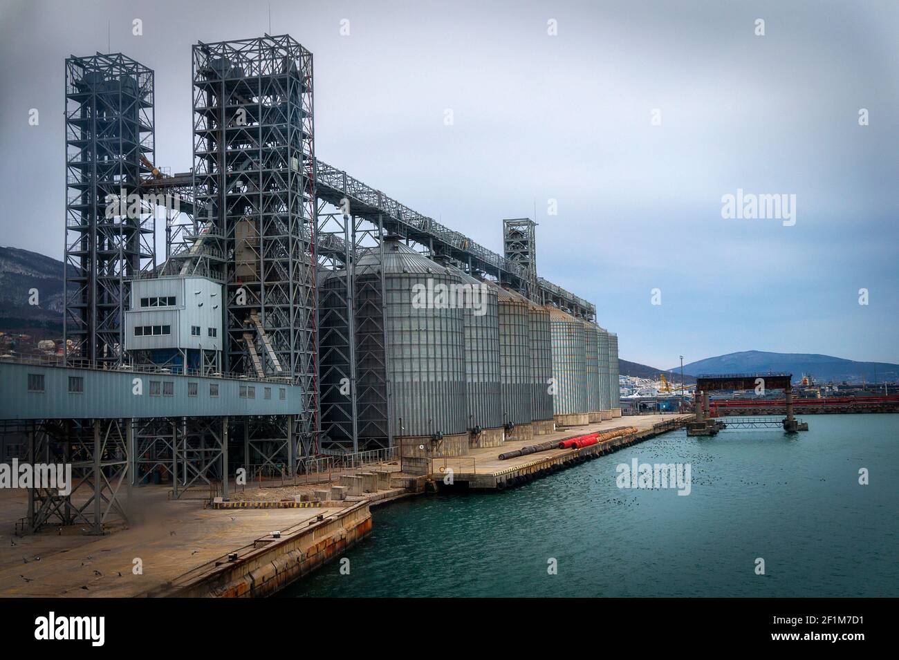 grain storage tanks in the port by the sea Stock Photo - Alamy