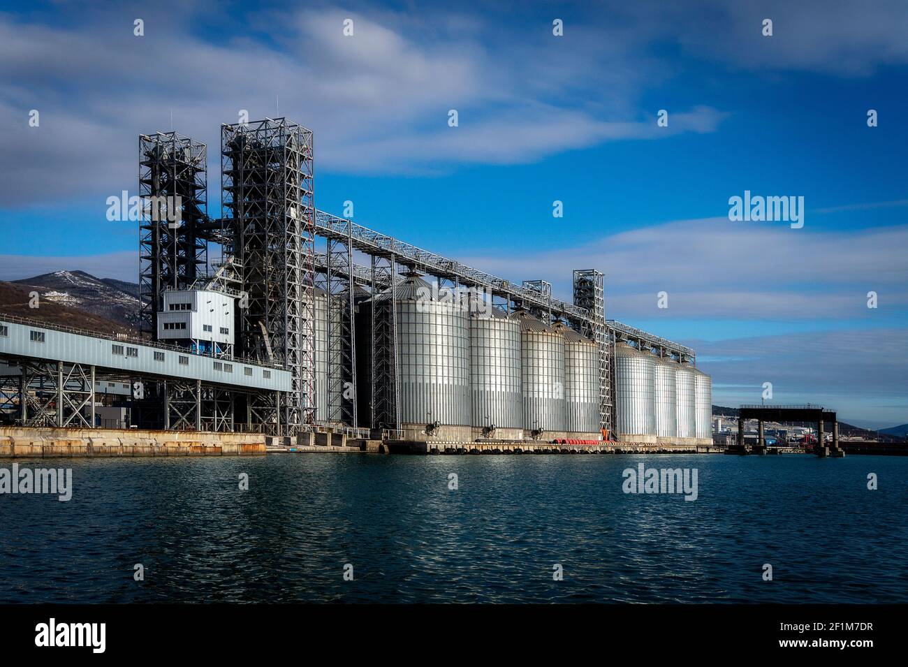grain storage tanks in the port by the sea Stock Photo - Alamy
