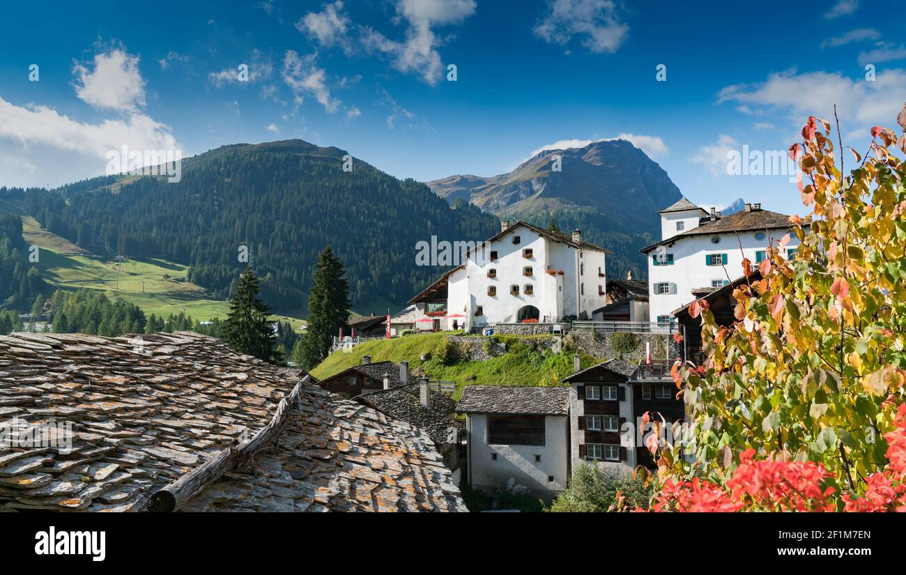 Picturesque mountain village with white stone houses and stone roofs ...