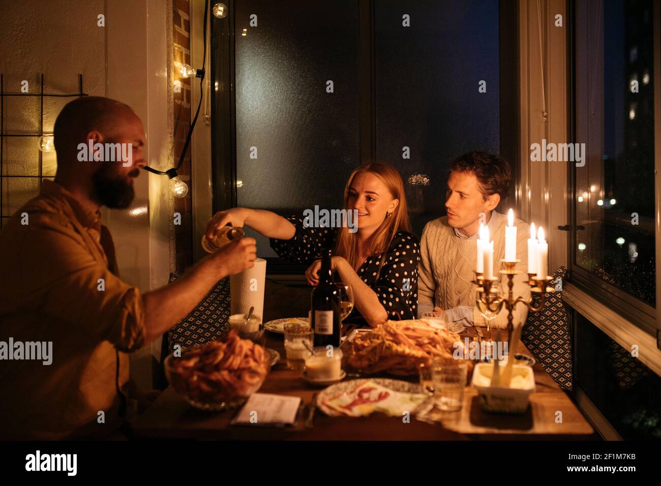 Friends having dinner together Stock Photo - Alamy