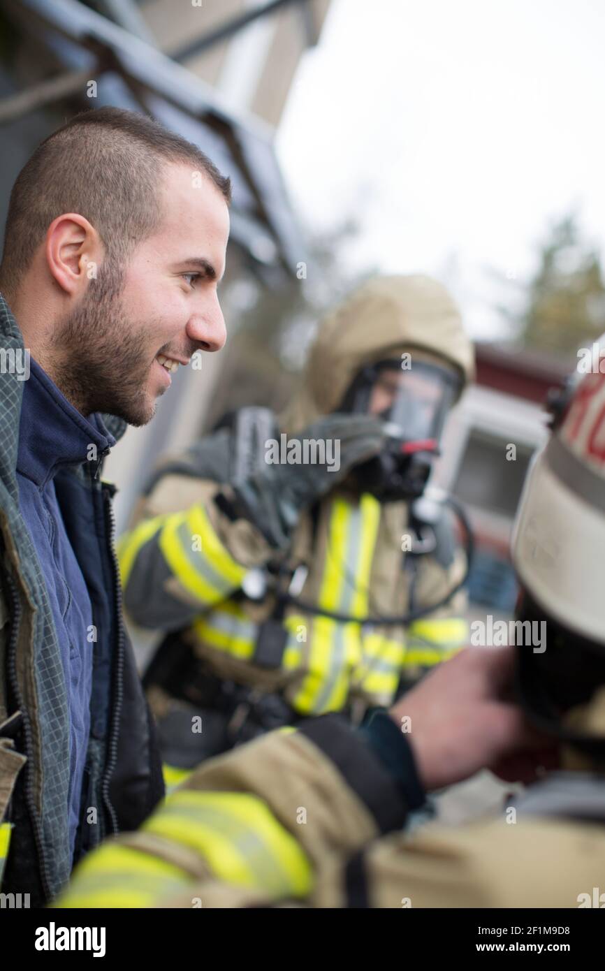 Firefighter talking hi-res stock photography and images - Alamy
