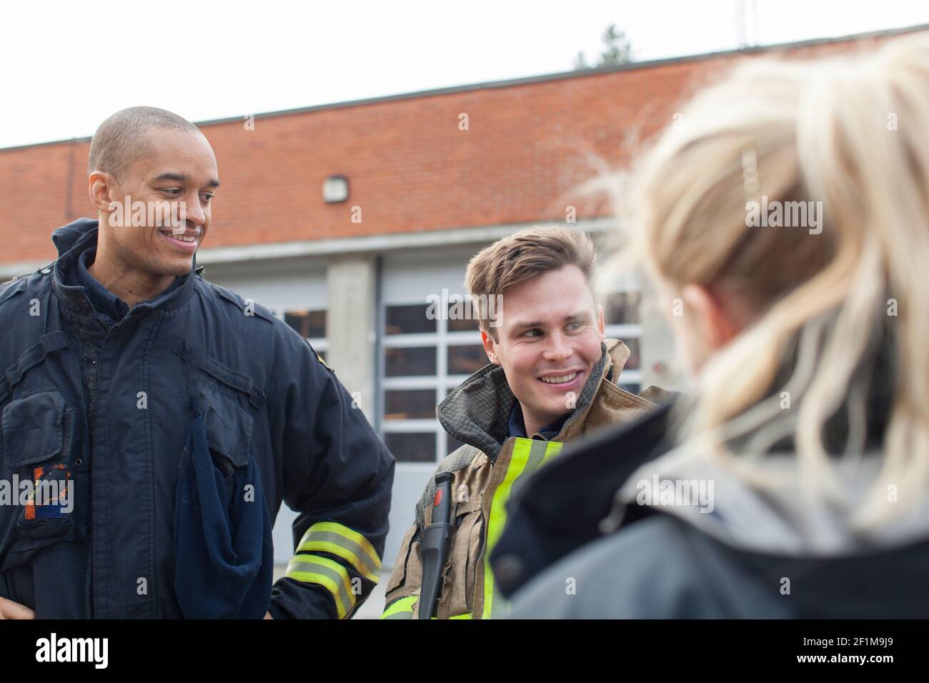 Group of smiling firefighters hi-res stock photography and images - Alamy