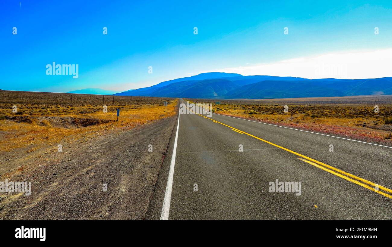 A picturesque empty road in Nevada, USA Stock Photo - Alamy