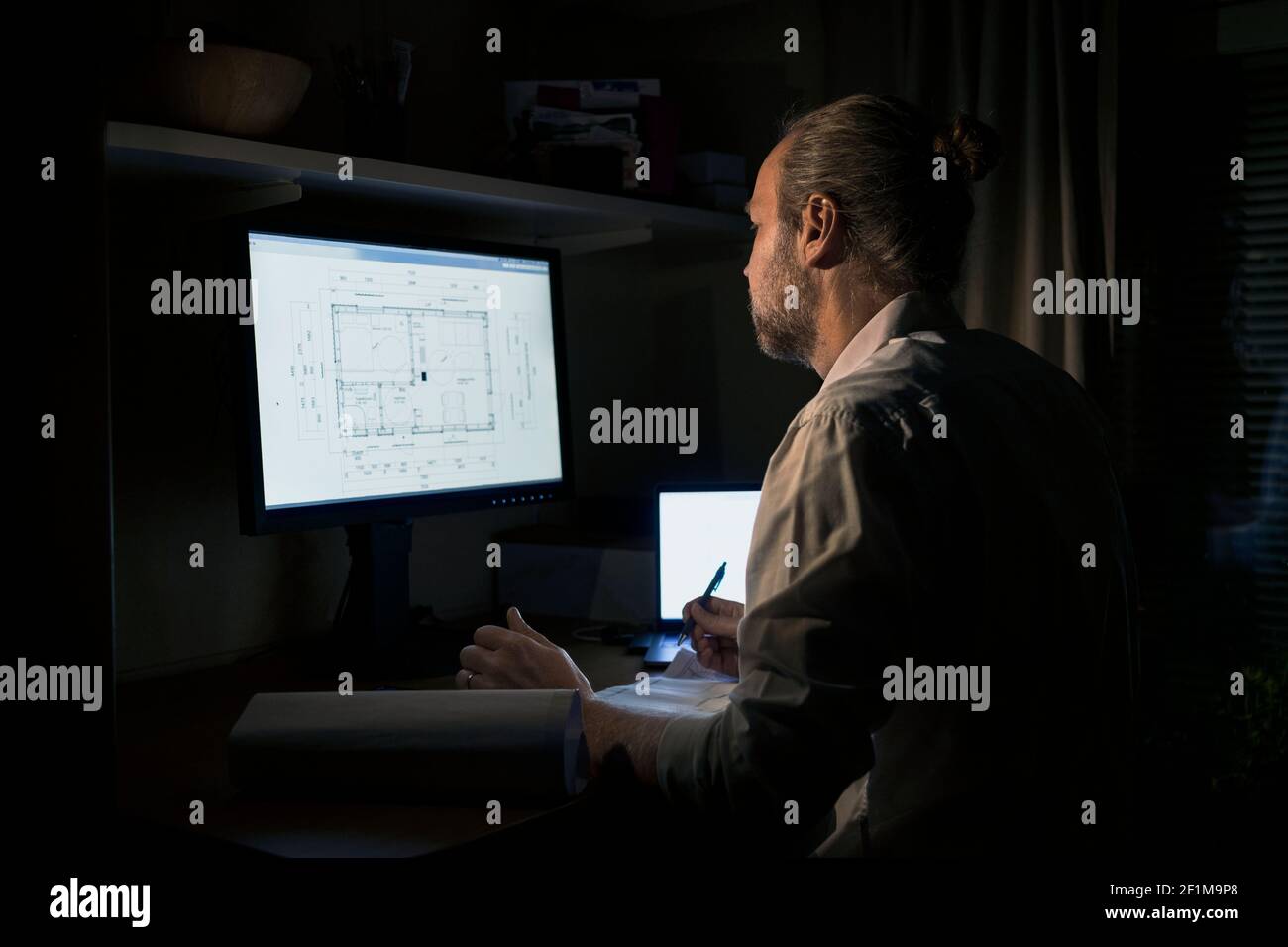 Architect blueprint working home hi-res stock photography and images ...