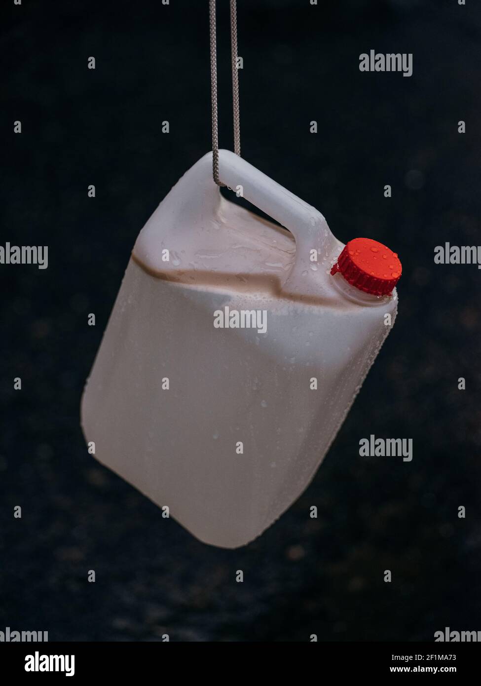 Hanging plastic bottle Stock Photo - Alamy