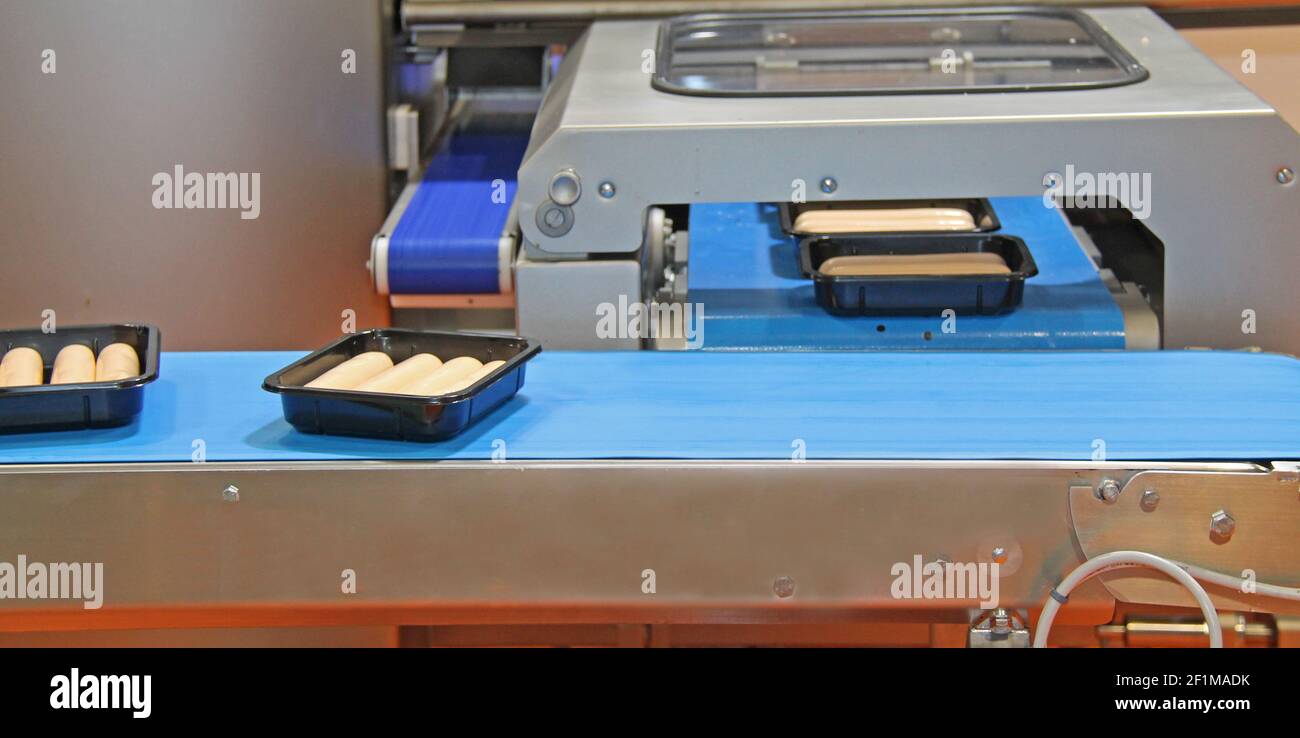 An Automated Sausage Packing and Conveyor System Stock Photo - Alamy