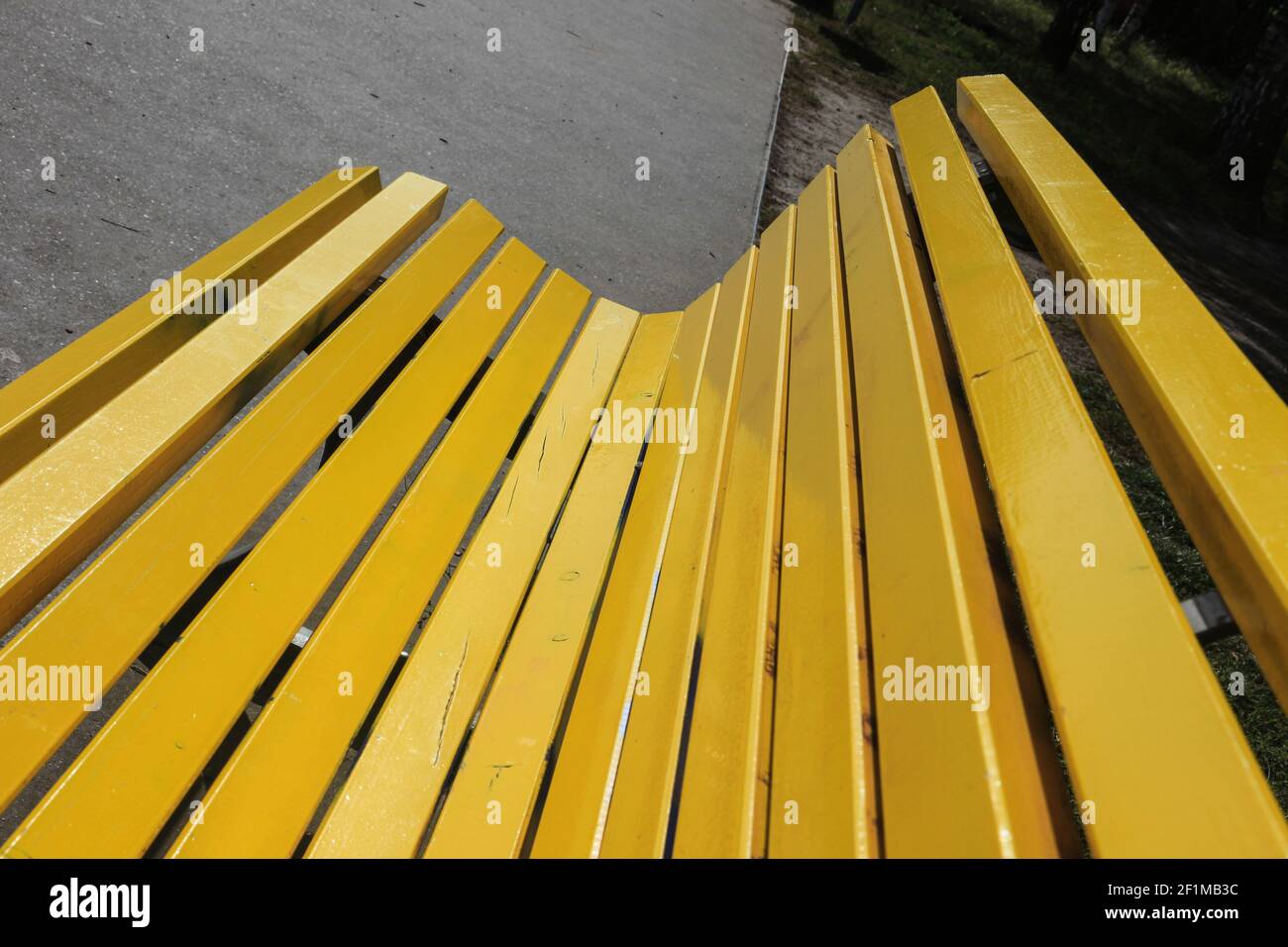 Yellow wooden bench Stock Photo - Alamy
