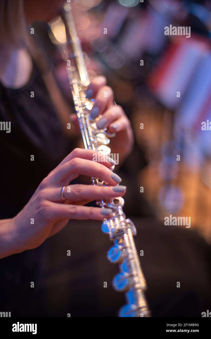 Girl playing the flute hi-res stock photography and images - Alamy
