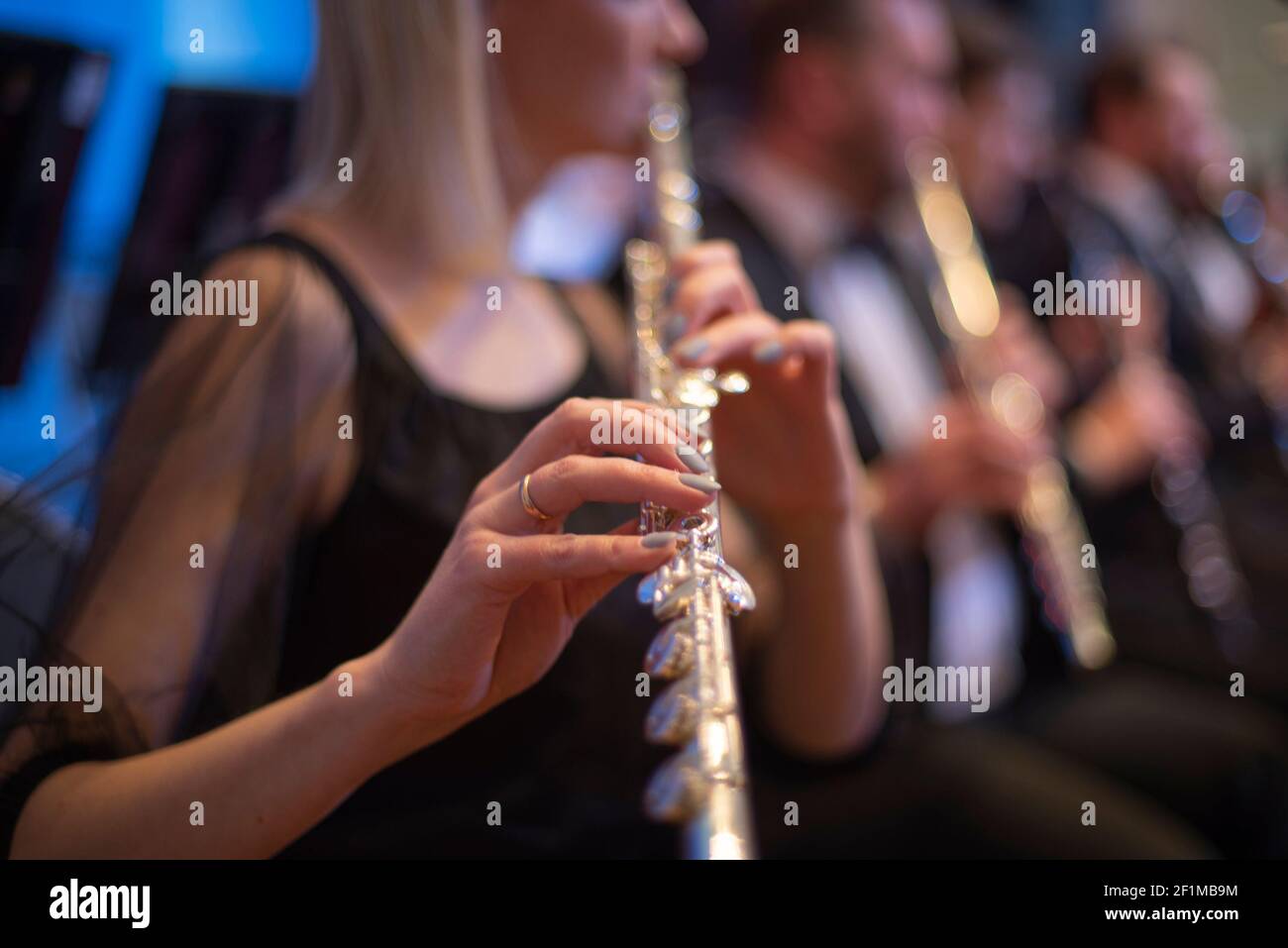 Girl playing piccolo hi-res stock photography and images - Alamy