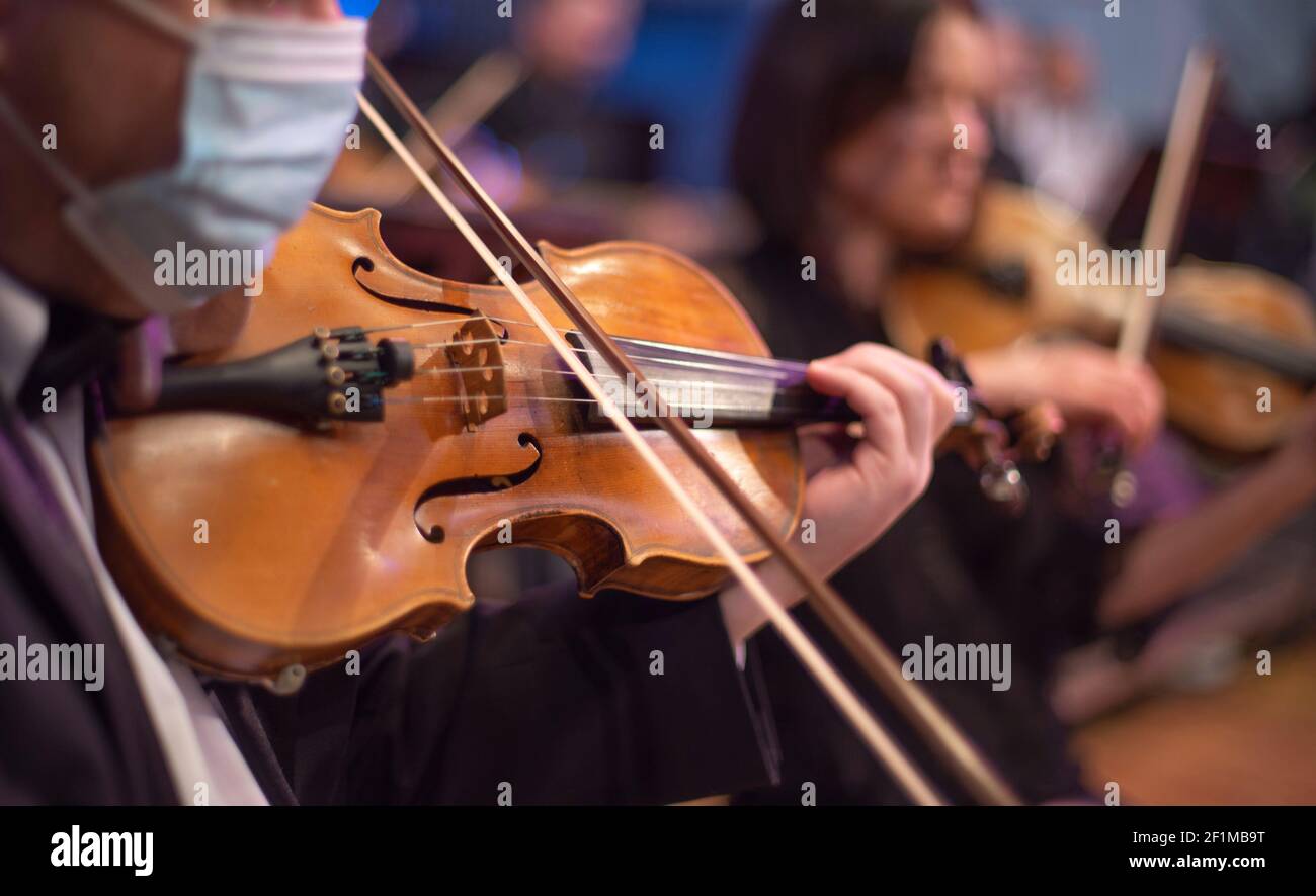 Female violinist performing orchestra hi-res stock photography and ...
