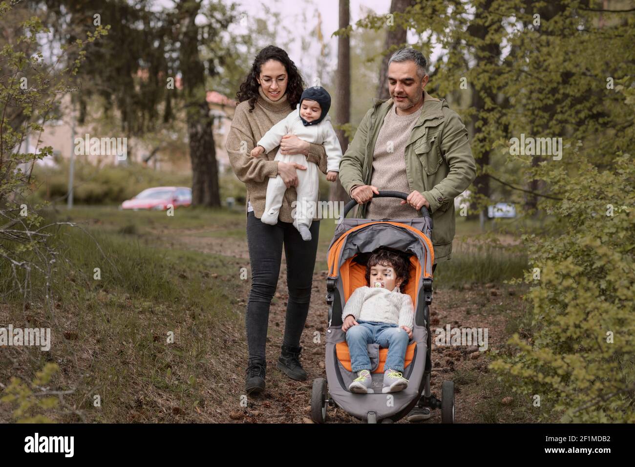 Two children walk hi-res stock photography and images - Alamy