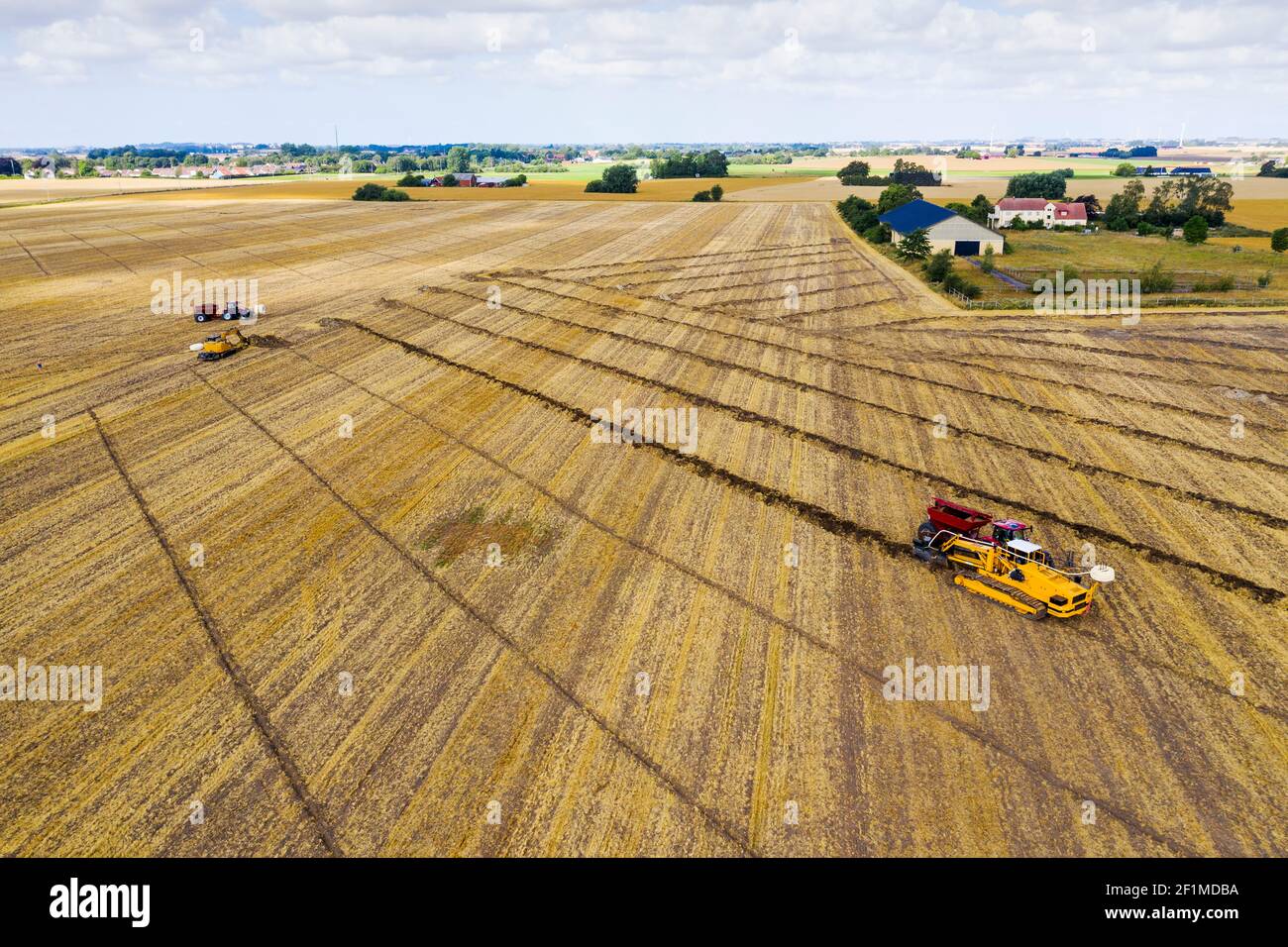 Aerial view of combine in field during harvest Stock Photo - Alamy