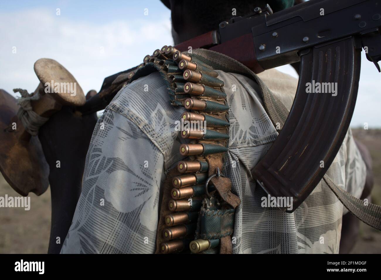 Turkana herder with rifles and bullets, Kenya Stock Photo - Alamy