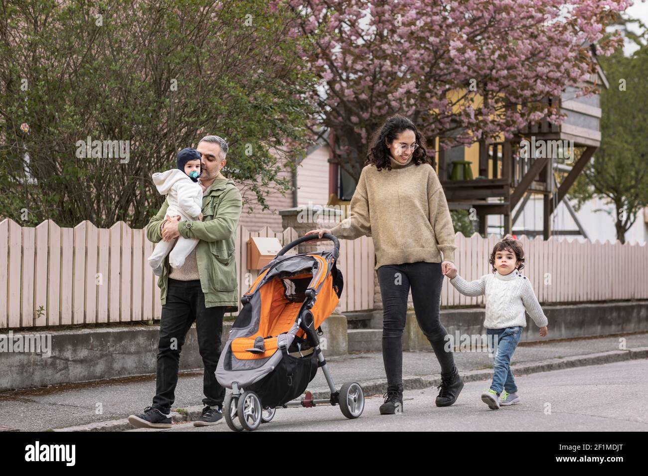 Woman two children walk hi-res stock photography and images - Alamy