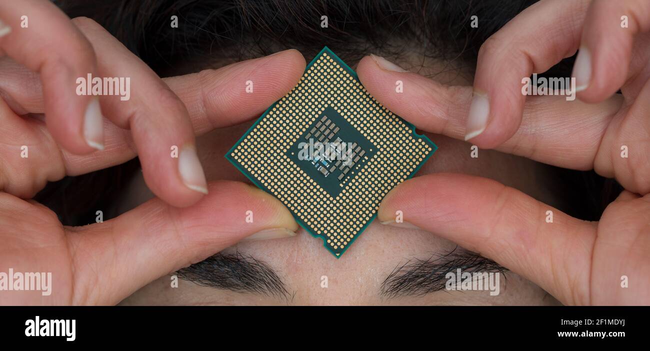 Computer cpu chip over the forehead, front view Stock Photo - Alamy