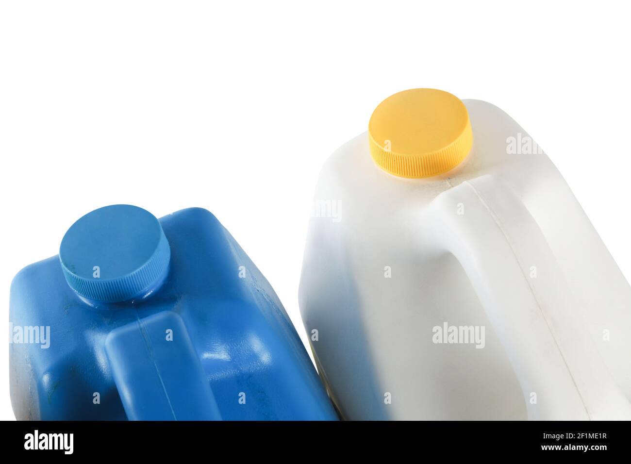 Colorful canisters in front of white background Stock Photo - Alamy