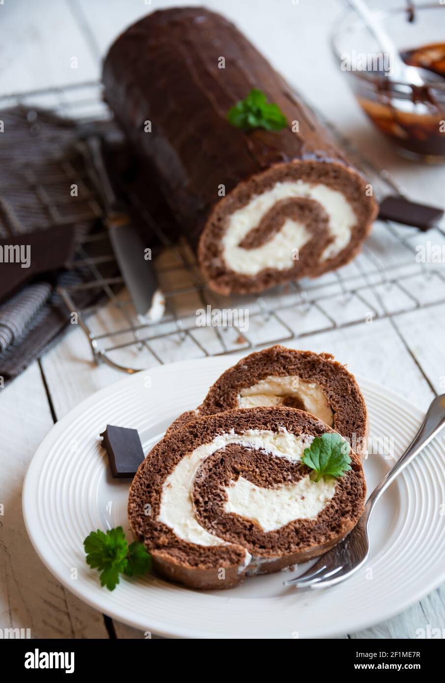 Sweet roll with wiped cream, delicious homemade chocolate cake Stock ...