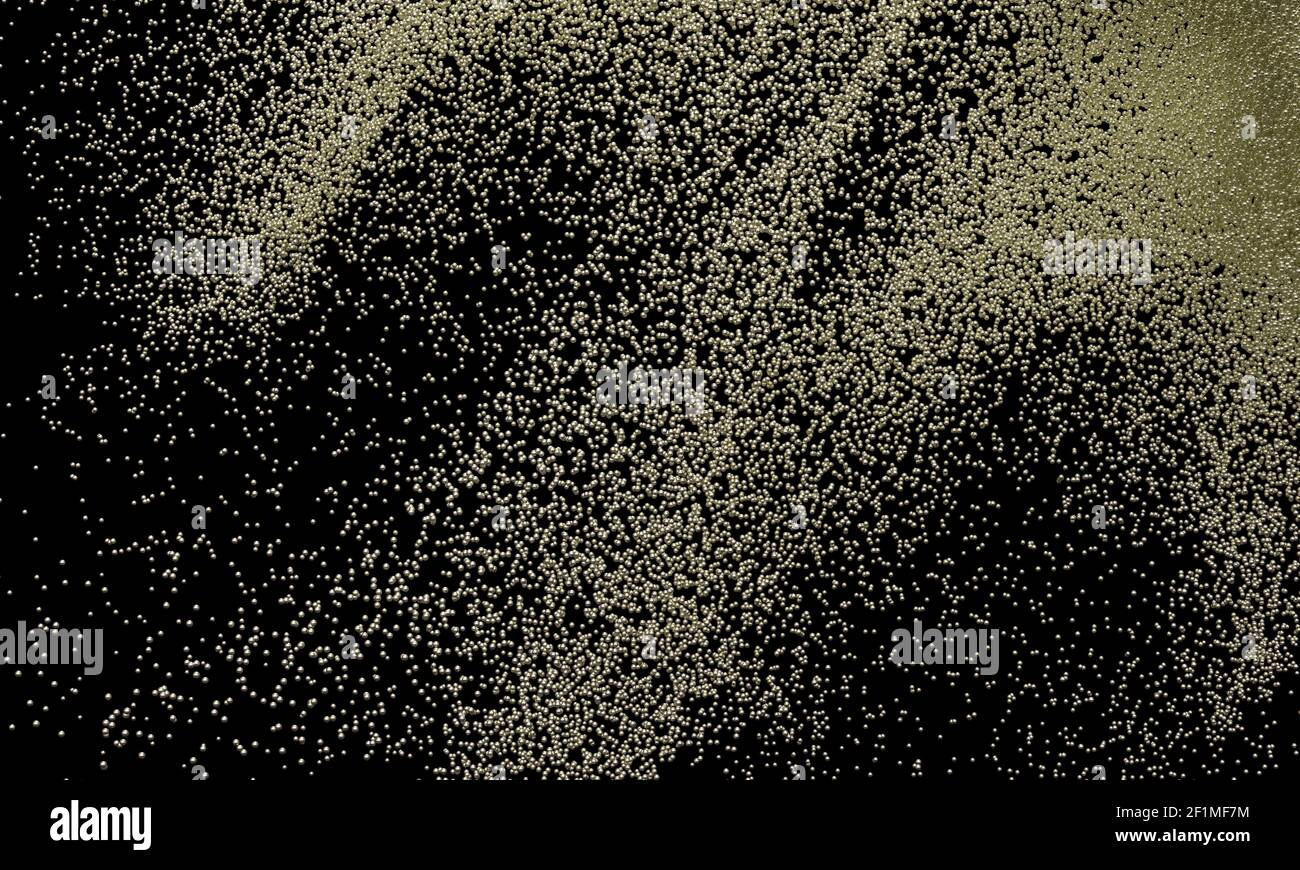 Gold dust on black background. 3d rendering Stock Photo - Alamy