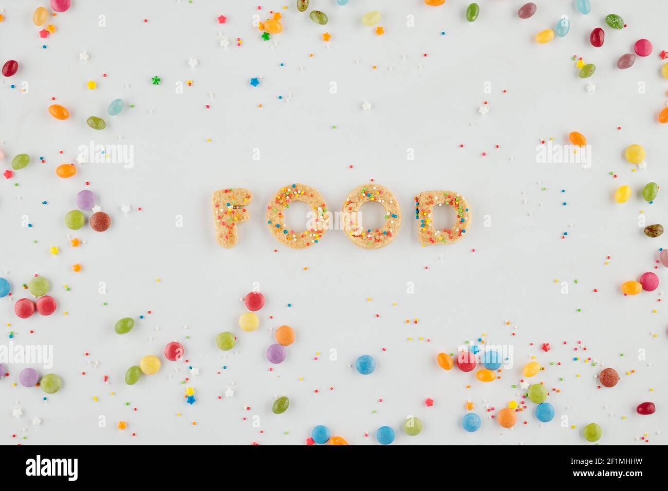 Words food made with sugar cookies and colorful sprinkles around ...