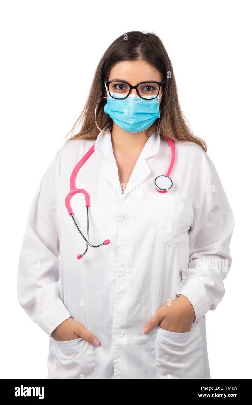 Caucasian doctor woman with pink stethoscope and mask on a white ...