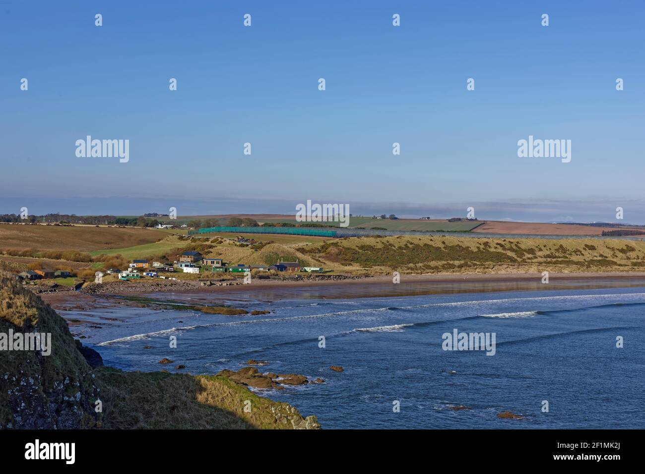Lines of waves running in towards the sandy beach at Corbie Knowe at ...