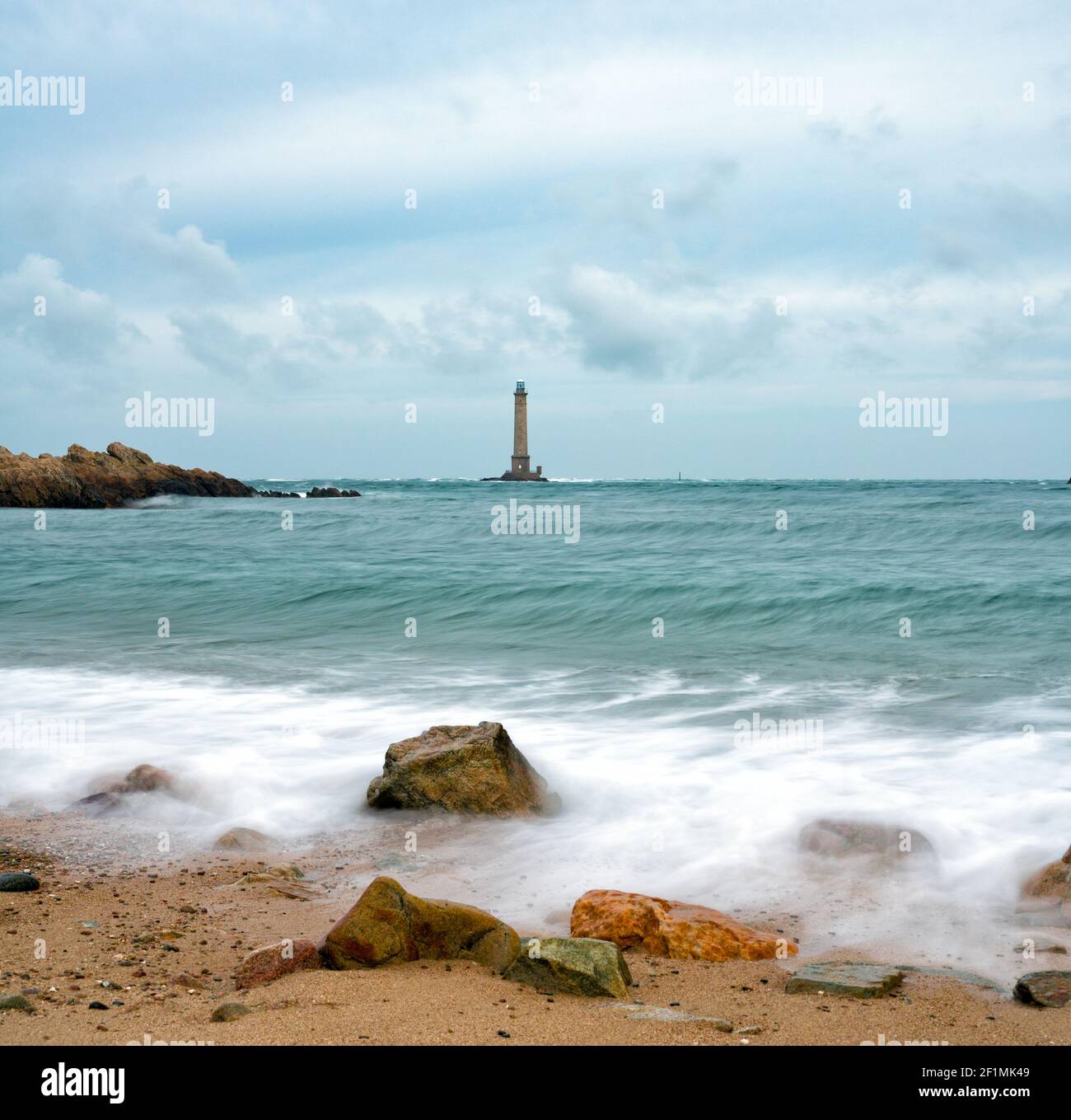 View of the Phare de Goury lighthouse on the north coast of Normandy in ...