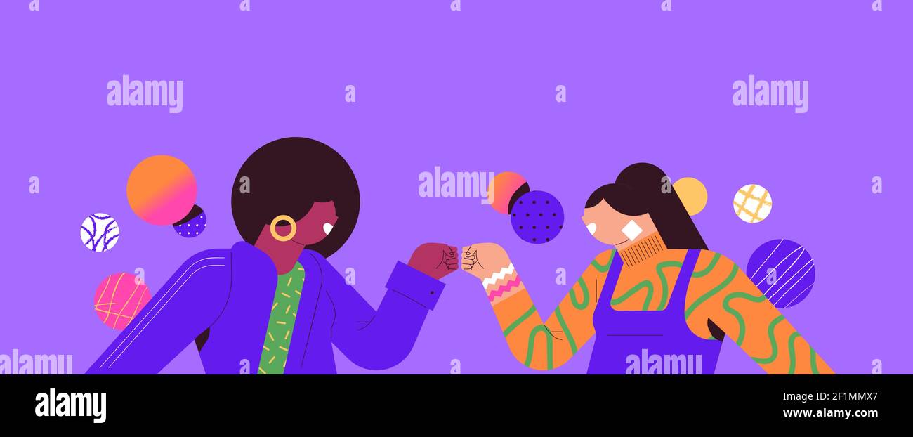 Happy girls doing fist bump hand gesture for special best friend ...