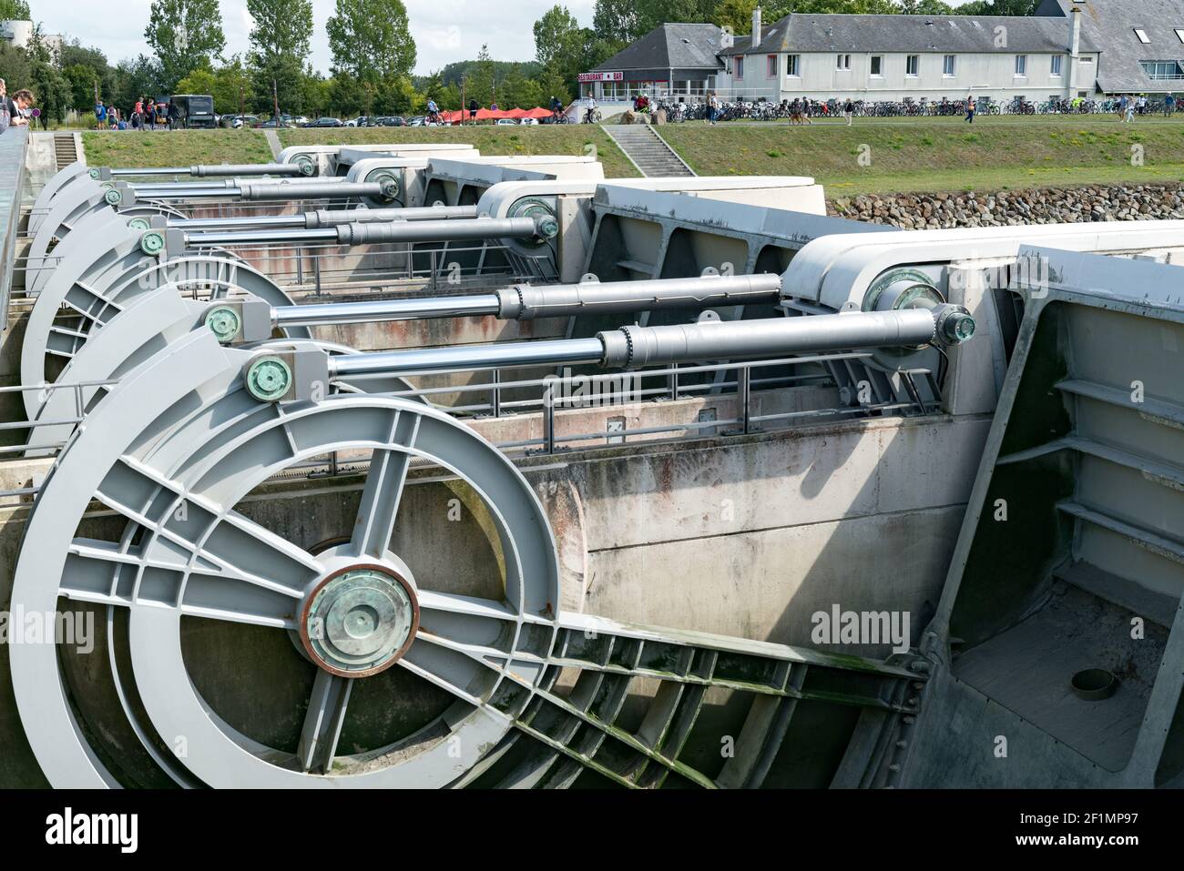 River locks and weir to regulate water flow in canal system Stock Photo ...