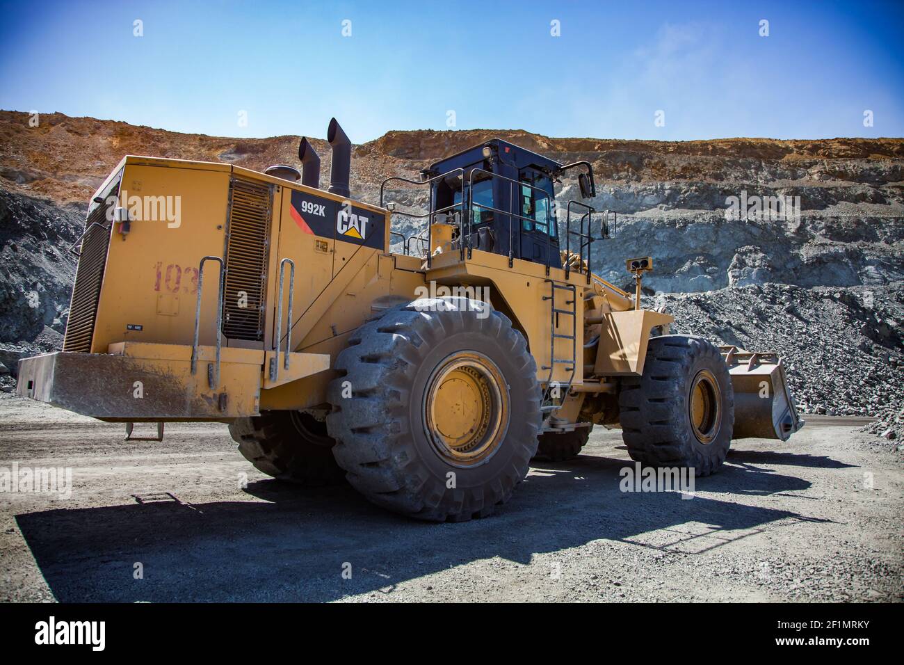 Metal ore with caterpillar excavator hi-res stock photography and ...