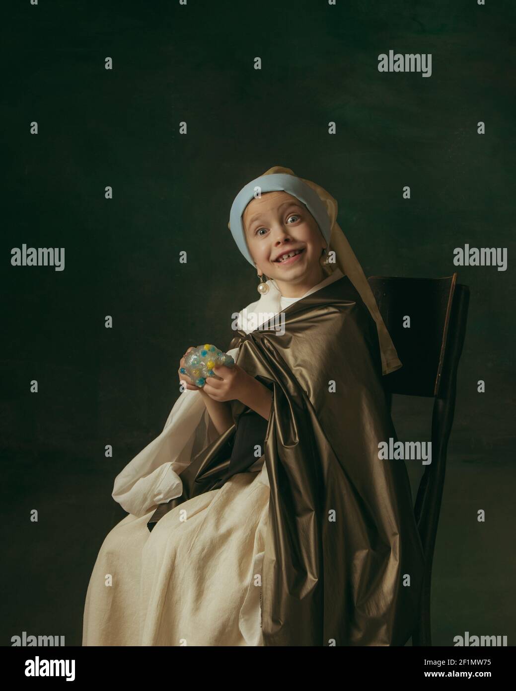 Slime antistress. Medieval little girl as lady with a pearl earring on ...