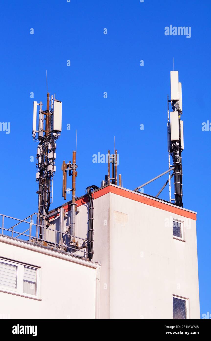 Cell phone masts on a house roof in Oberursel, Germany Stock Photo - Alamy