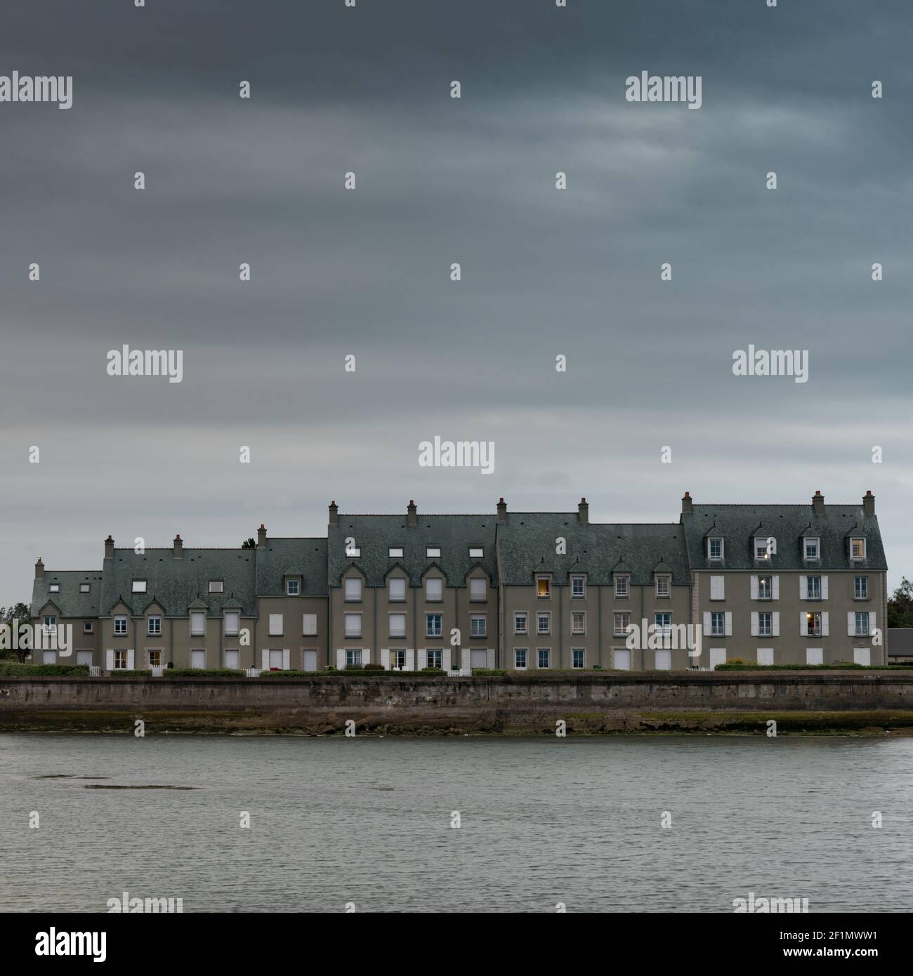 Historic stone houses in typical architectural style of Normandy in ...