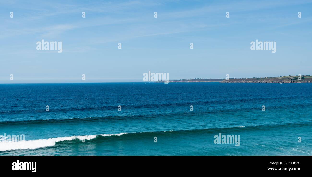 Ground swell waves rolling on the Blancs Sablons beach in Brittany ...