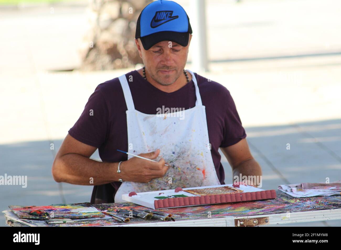 Street artist painting in Palma de Mallorca Stock Photo - Alamy