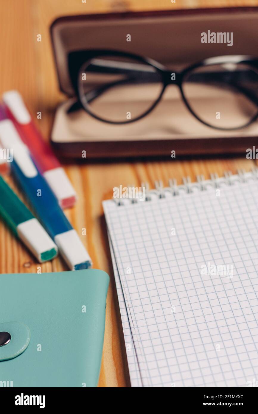 notepads felt-tip pens stationery glasses in a case work desk Stock ...
