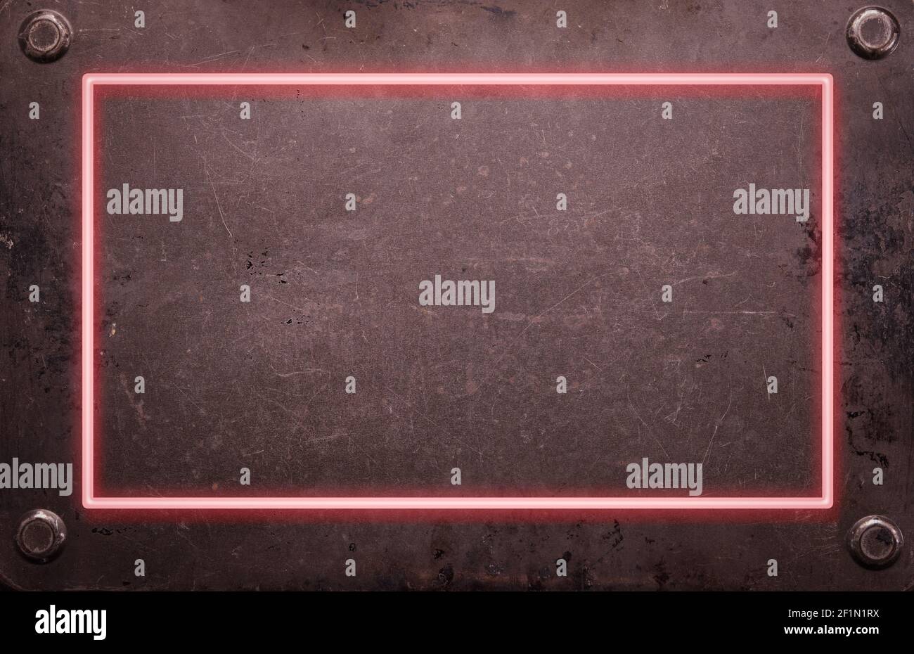 red glowing neon frame on rusty metal sheet background, copy space ...