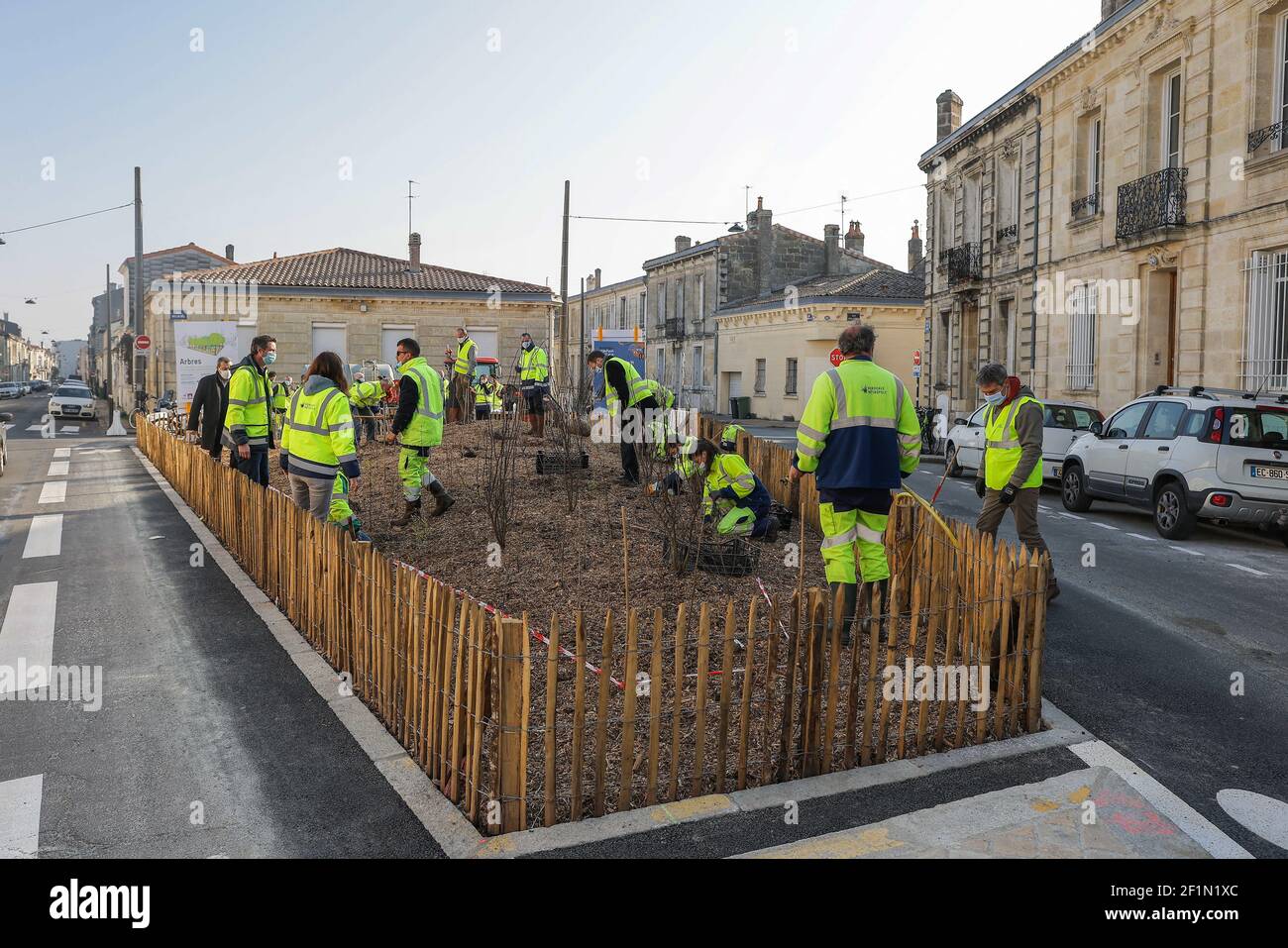 The mayor of Bordeaux, Pierre Hurmic, plants the city's first micro ...