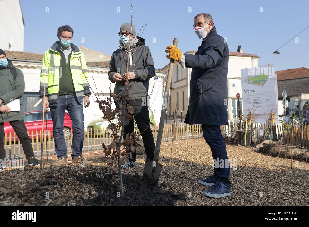 The mayor of Bordeaux, Pierre Hurmic, plants the city's first micro ...