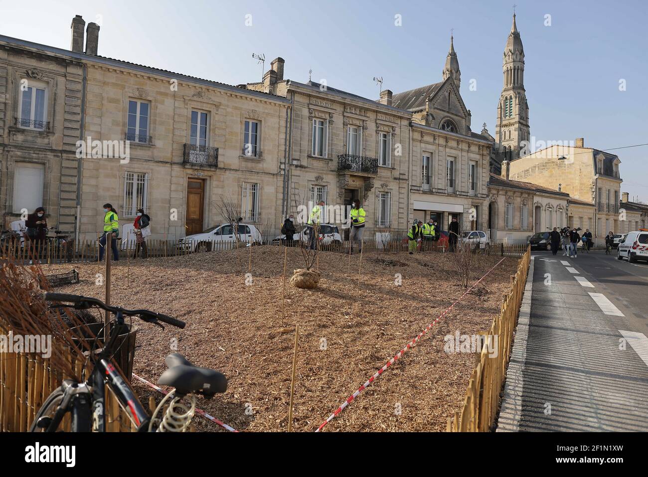 The mayor of Bordeaux, Pierre Hurmic, plants the city's first micro ...